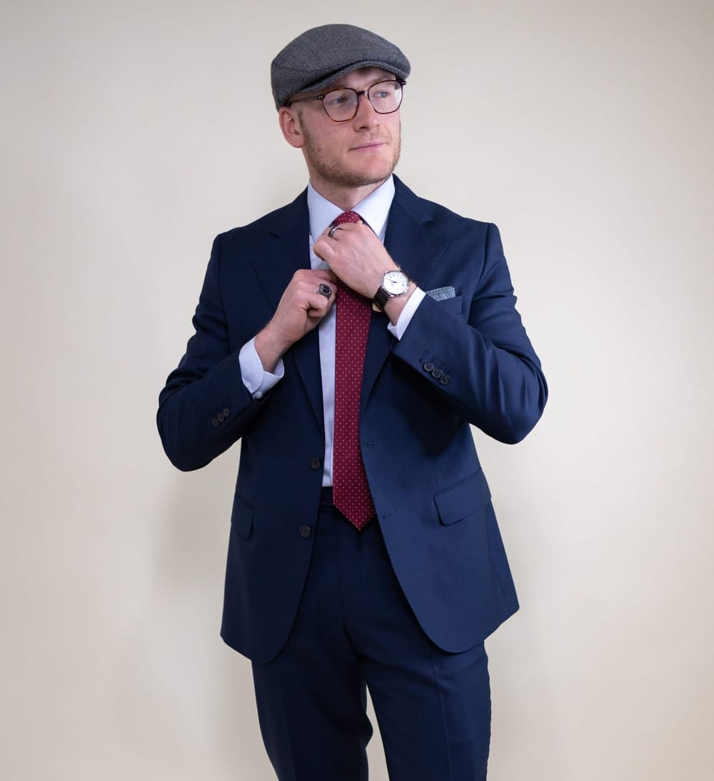 How to Wear a Navy Blue Suit (6 Outfit Ideas for Men)